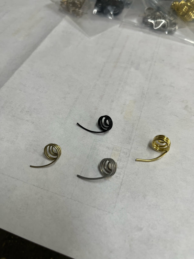 Springy Arrow rest coils